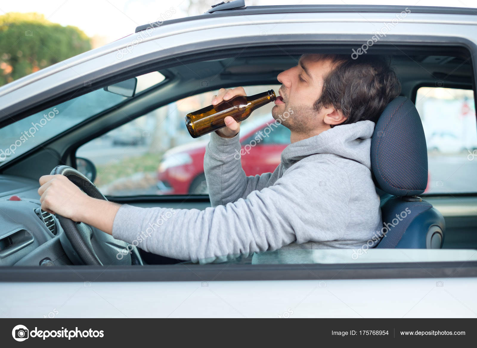 Don't drink and drive campaign.Drunk and driving a car with a bo Stock ...