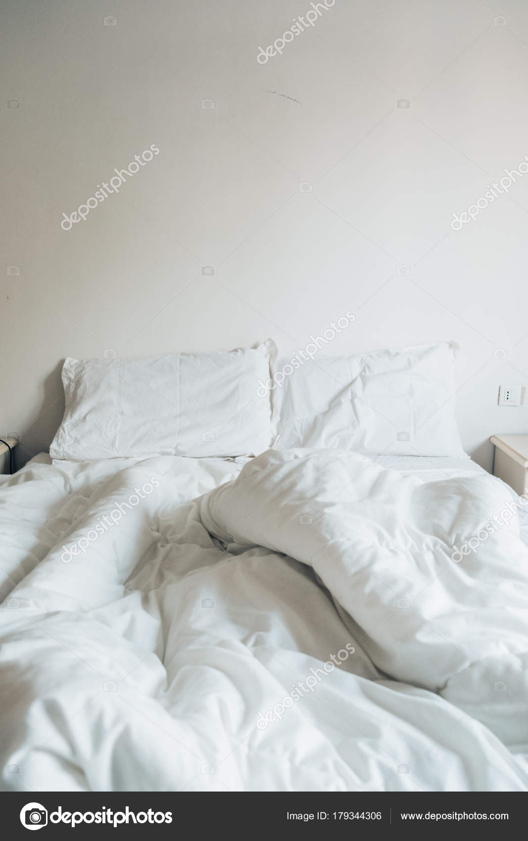 Messy White Bed Sheets