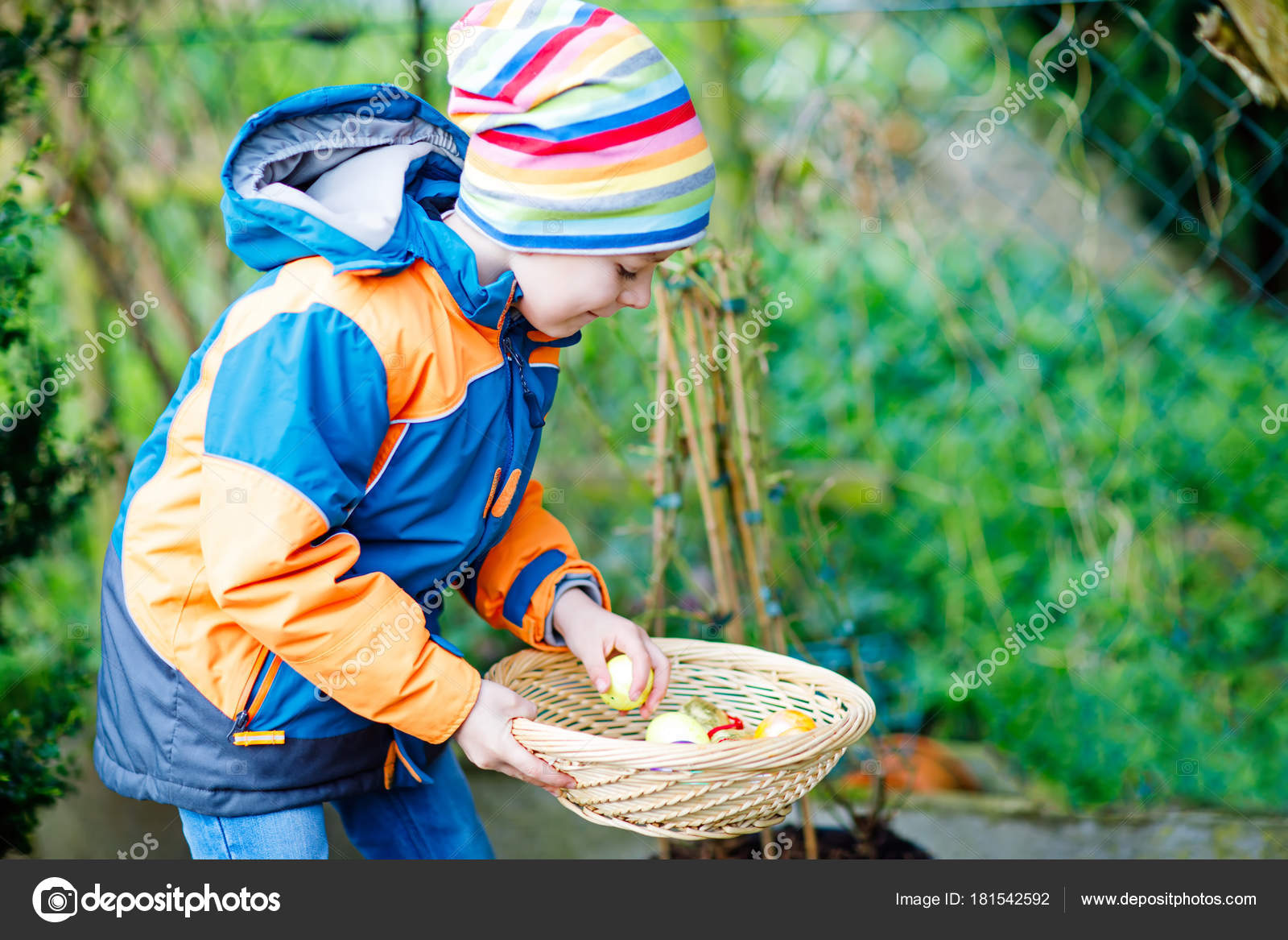 Cute adorable little kid boy making an egg hunt on Easter. — Stock ...