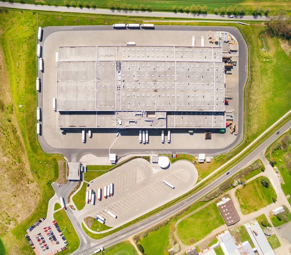 Storage and freight terminal with trucks — Stock Photo © vladvitek ...