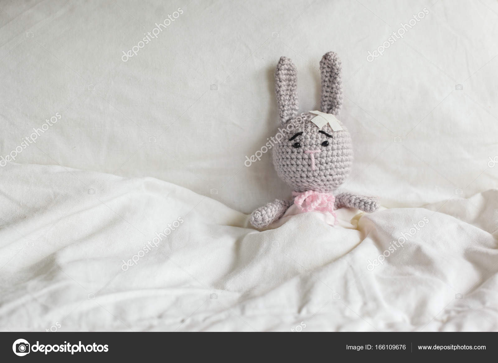 Ill Grey Toy Rabbit Plaster Head White Bedroom Stock Photo by ©Zaikina ...