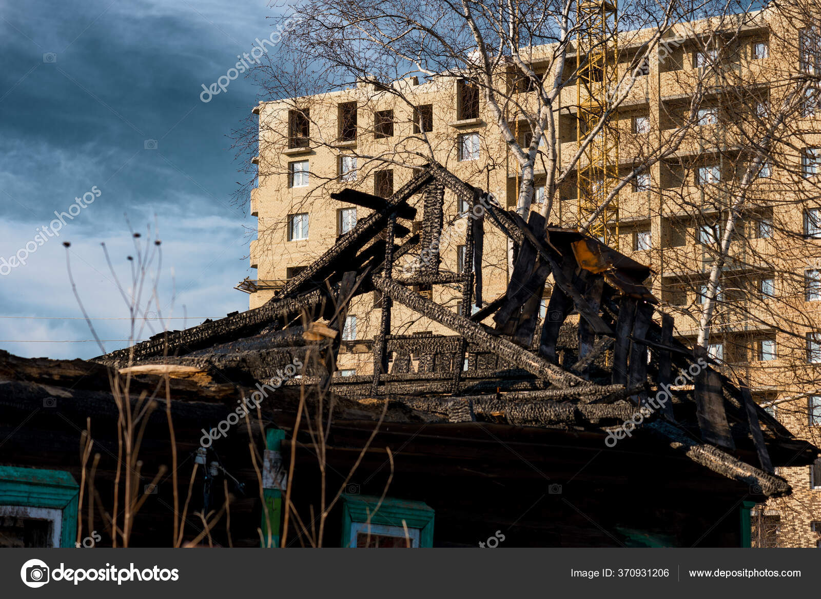 Download - A modern city with a burnt out old house in the center ...