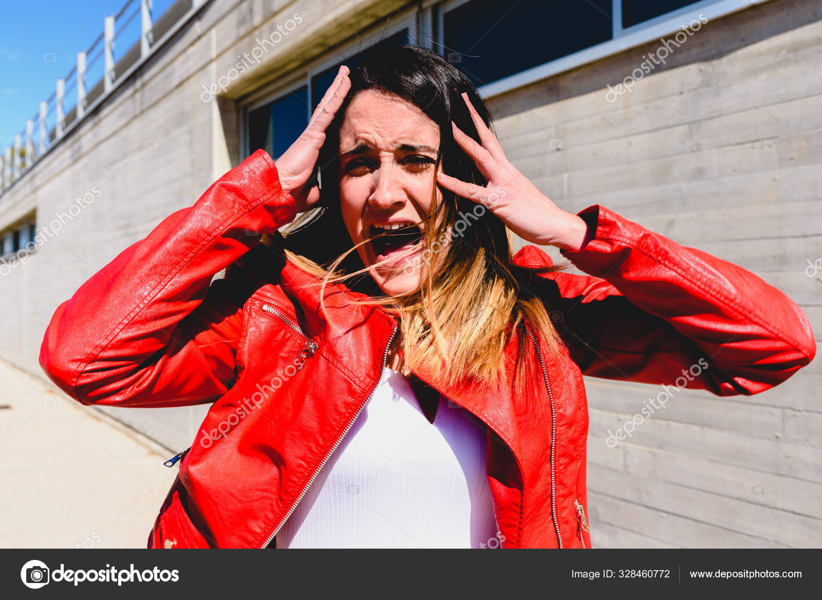 Scared woman is scared and makes a panic face while screaming fo Stock ...