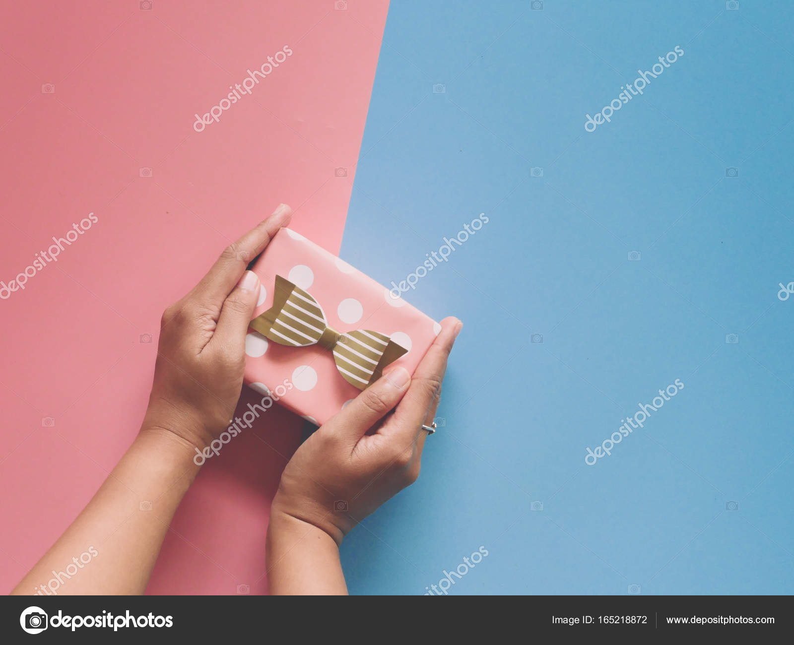Gift box on the color paper — Stock Photo © chayathon #165218872