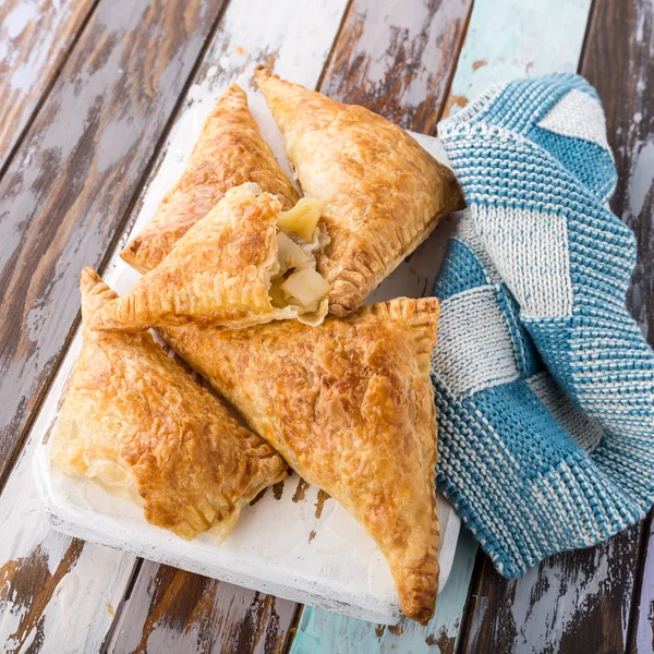 Puff pastry triangles Stock Photo by ©IMelnyk 170770772
