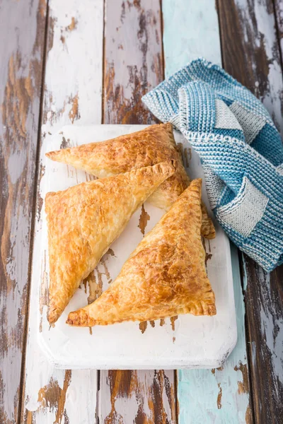 Puff pastry triangles Stock Photo by ©IMelnyk 170770772