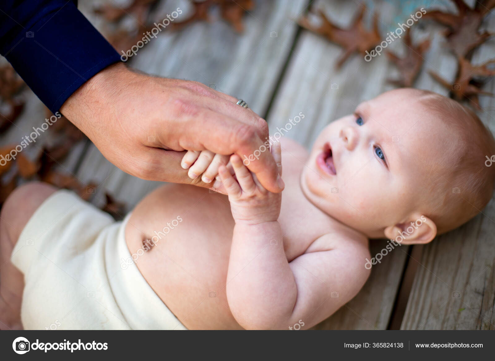 Funny Newborn Child Gripping Hand His Father Baby Boy Lying Stock Photo ...