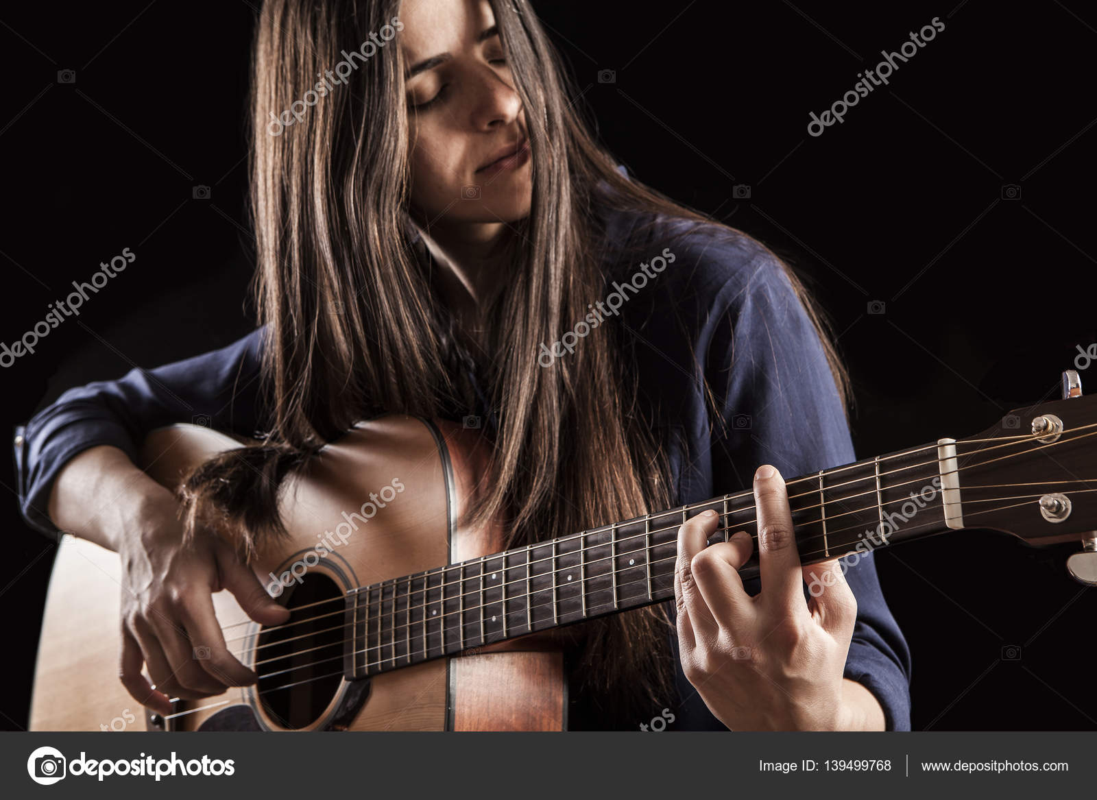 Woman playing acoustic guitar — Stock Photo © tommasolizzul #139499768 Woman playing acoustic guitar — Stock Photo © tommasolizzul #139499768