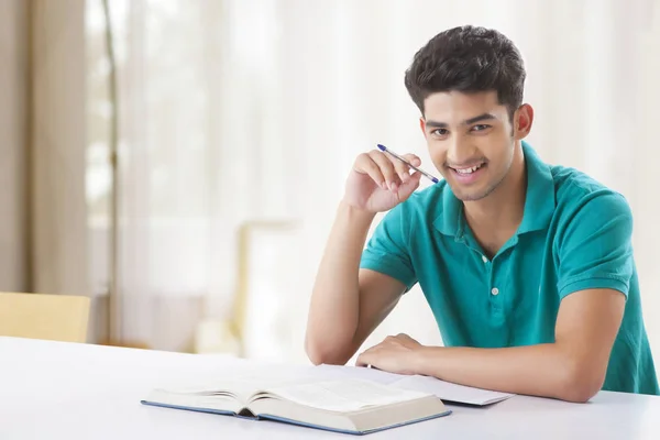Indian boy studying Stock Photos, Royalty Free Indian boy studying ...