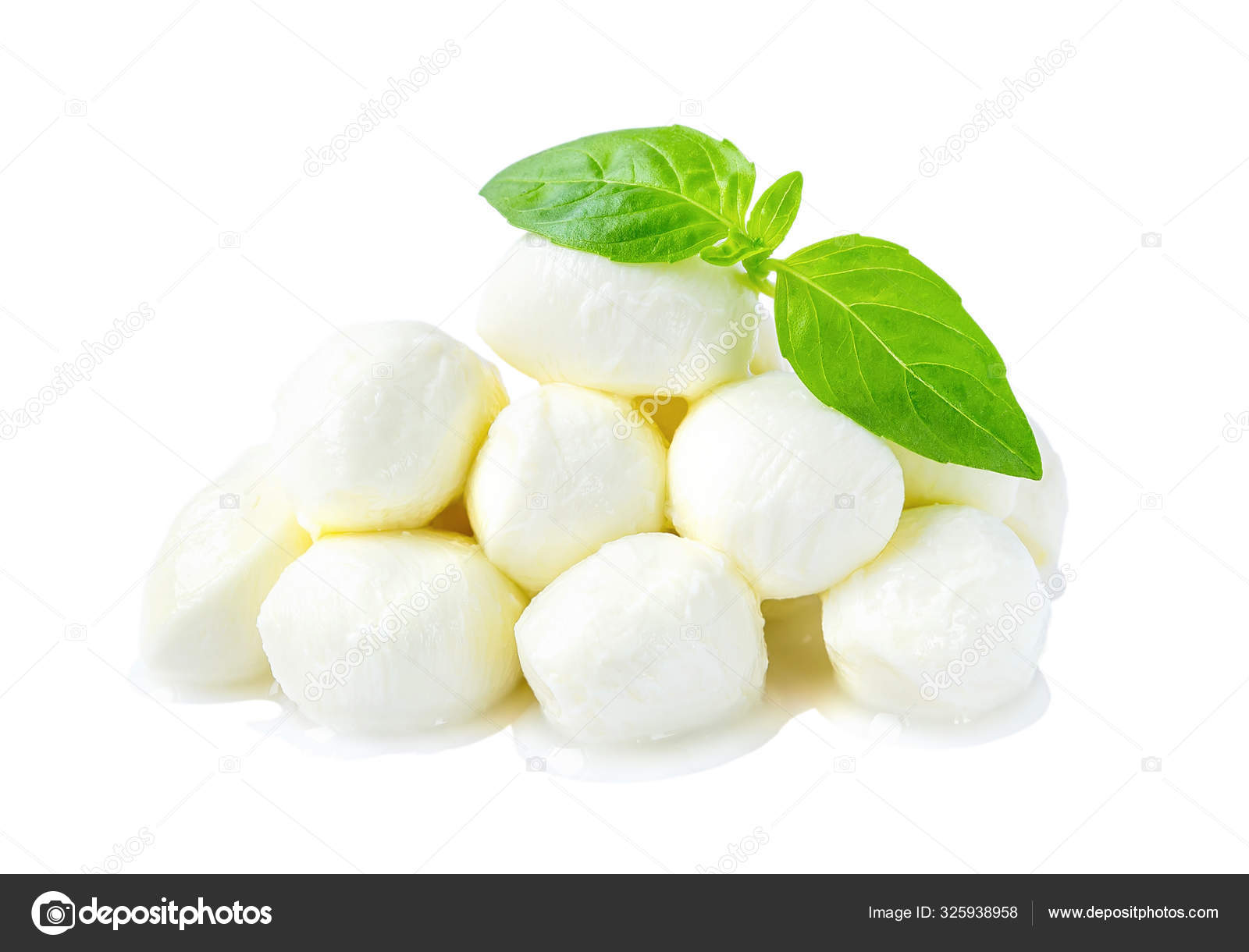 Heap of mini mozzarella cheese balls and basil isolated. Stock Photo by ...