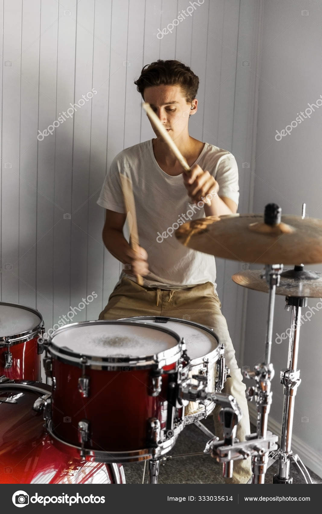 Drummer Practicing Slow Drum Beat Rudiments On His Home Drum Kit ...
