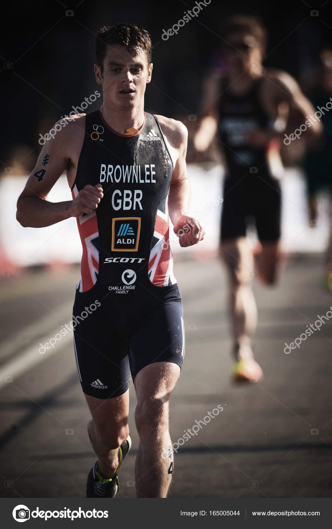 Jonathan Brownlee (GBR) running trough the streets of the old ci ...