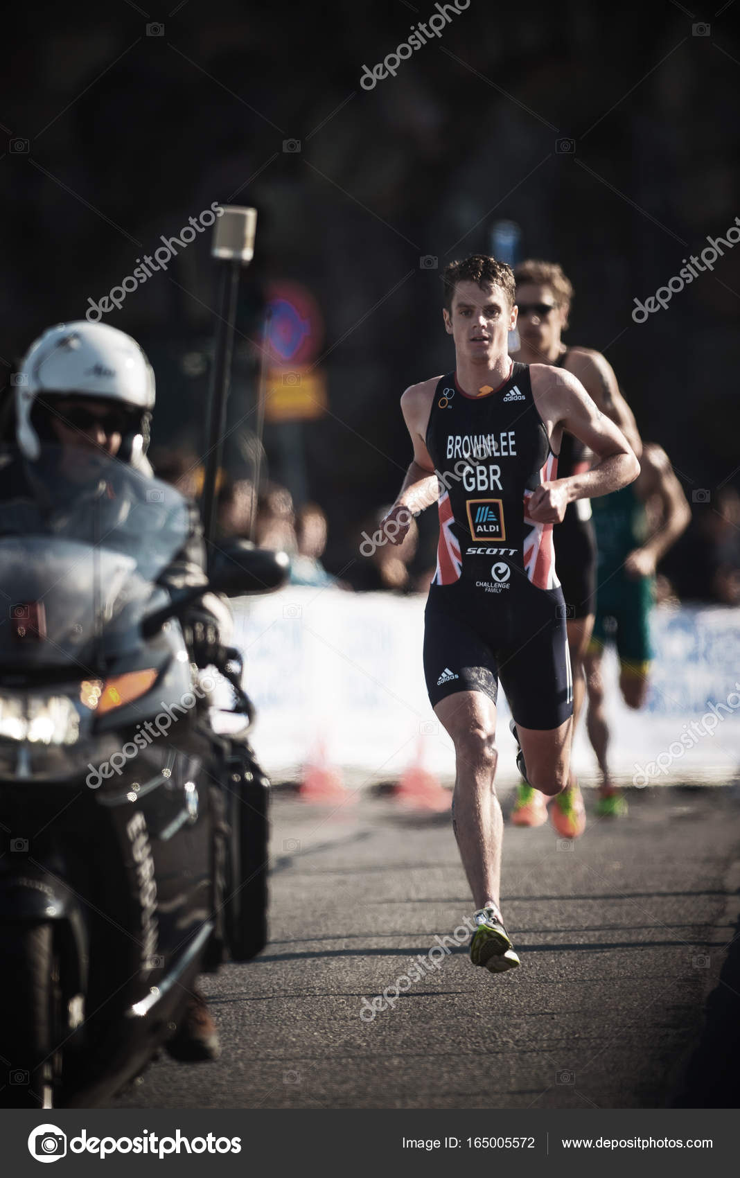 Jonathan Brownlee (GBR) running trough the streets of the old ci ...