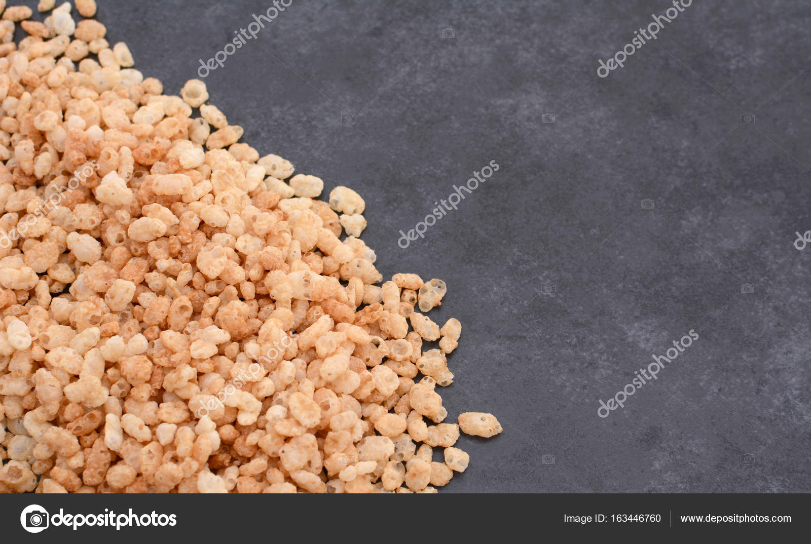 Crisped rice breakfast cereal on grey slate background Stock Photo by ...