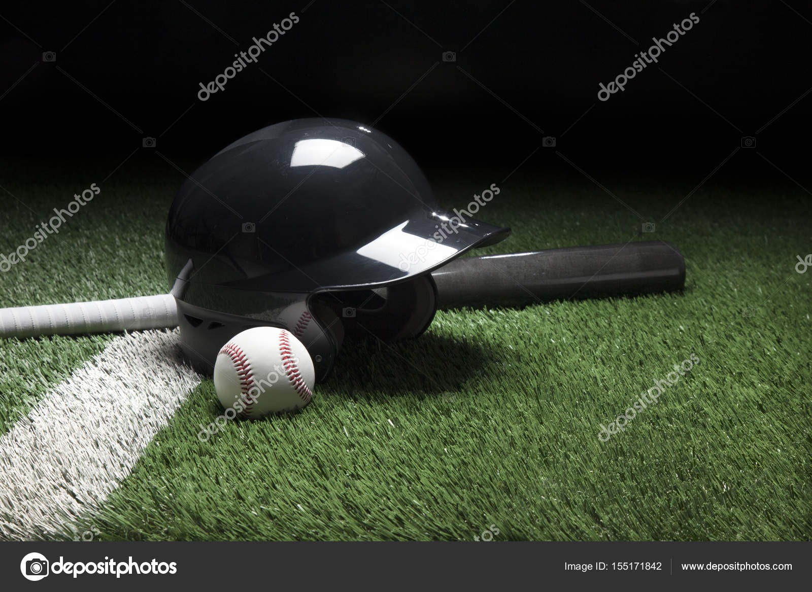 Baseball batting helmet bat and ball on field with stripe and da ...