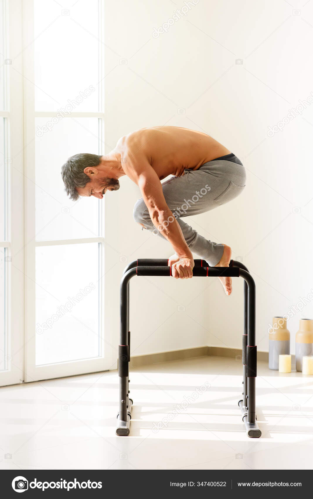 Man Doing Planche Exercise On High Bars Stock Image Image Of Parallel ...
