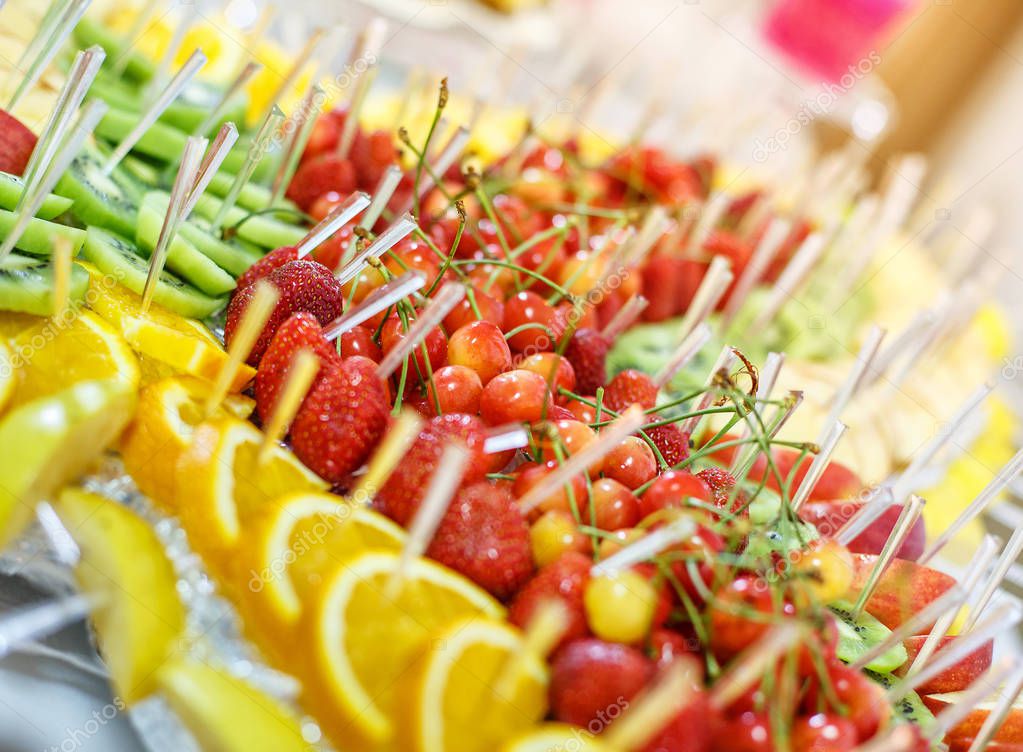 Fancy served fruit buffet on luxurious party table in restaurant ...