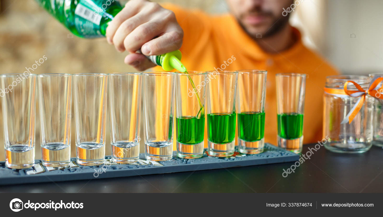 Barman pouring absinthe in a glass. Concept of elite alcohol. — Stock ...