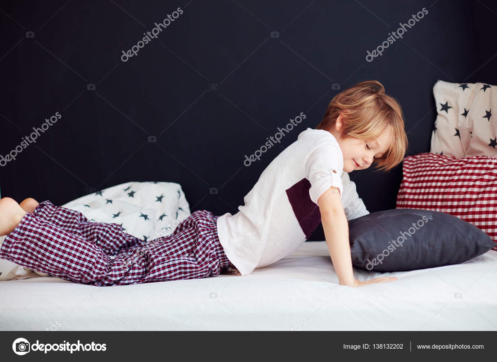 Smiling kid waking up languidly in the morning — Stock Photo ...