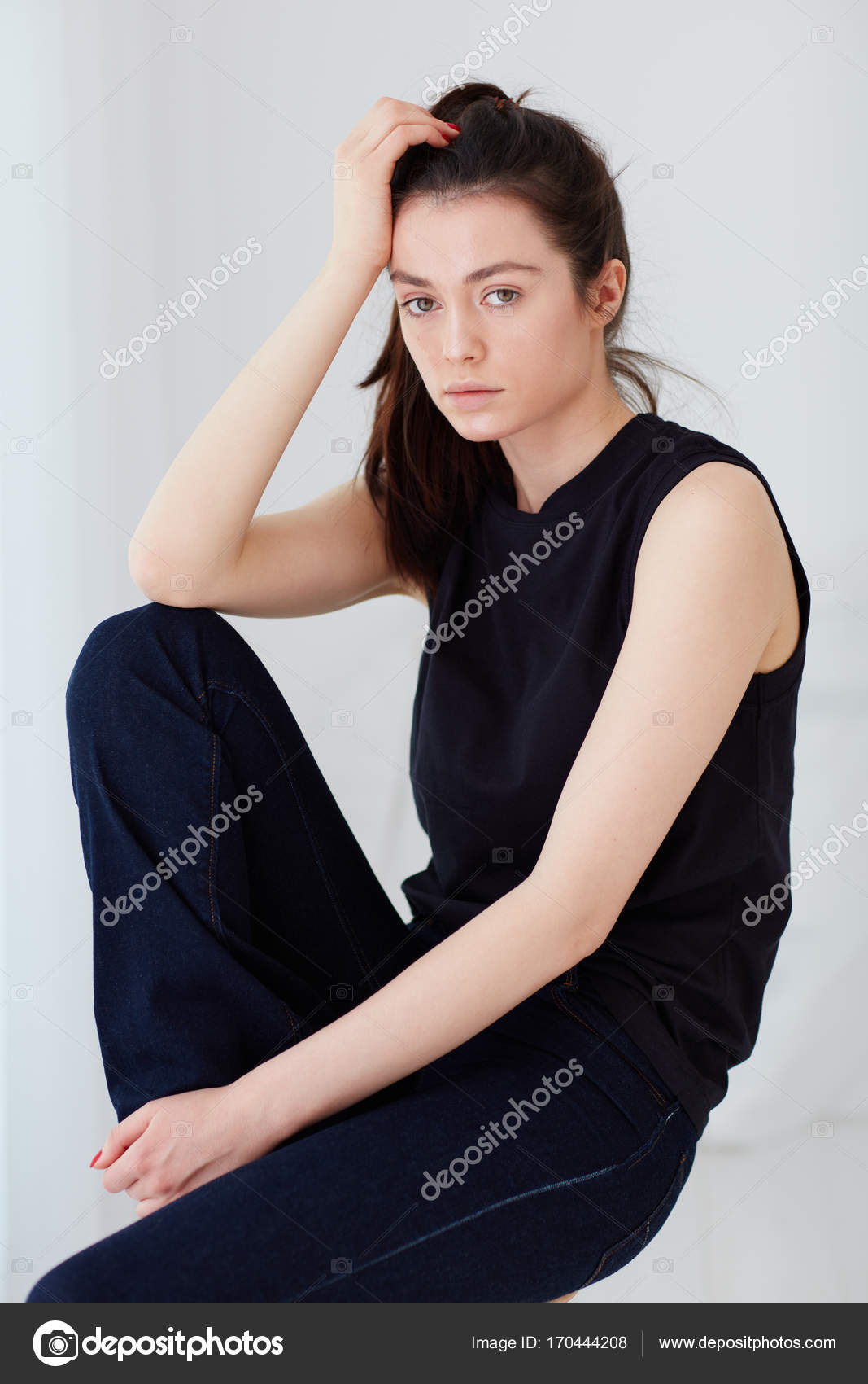 Young female posing on model test photo shoot with natural day light ...