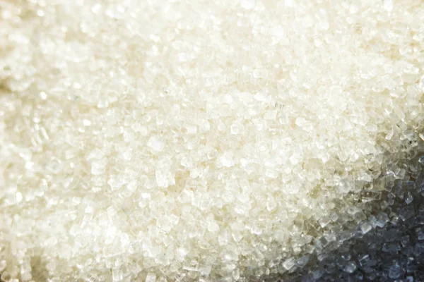 Macrophotography of sugar. Sugar pieces white sand texture., sugar ...