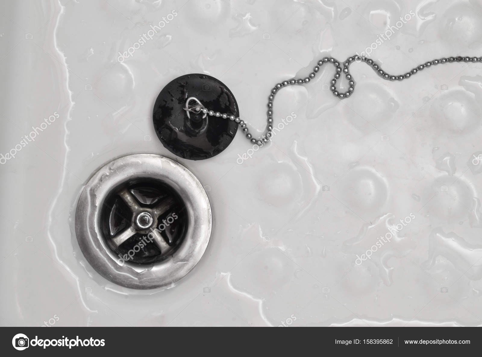 Draining water with the drain rubber plug Stock Photo by ©Gustavo ...