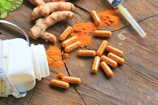 Turmeric capsule Stock Photos, Royalty Free Turmeric capsule Images ...
