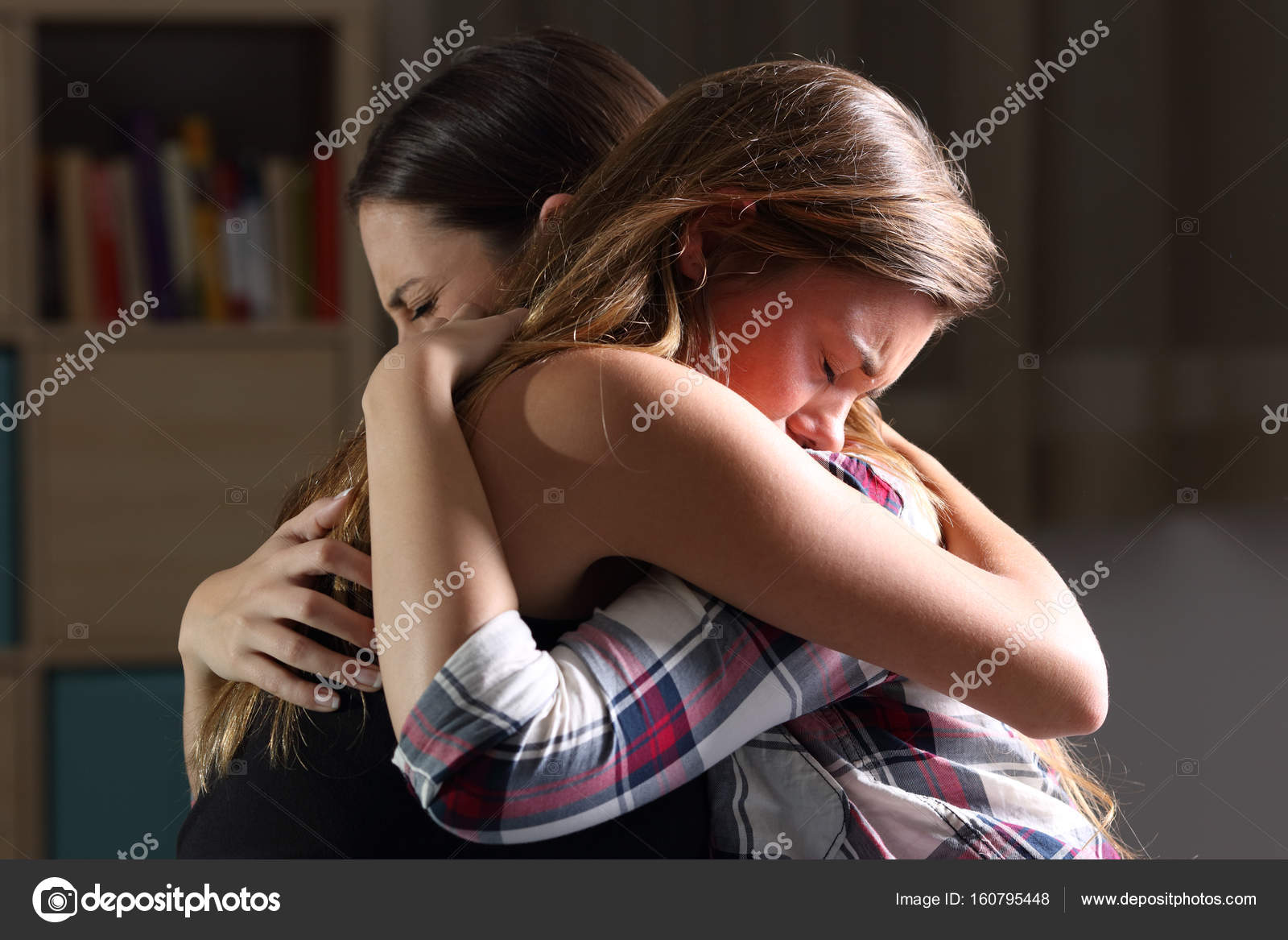 Two Sad Friends Hugging