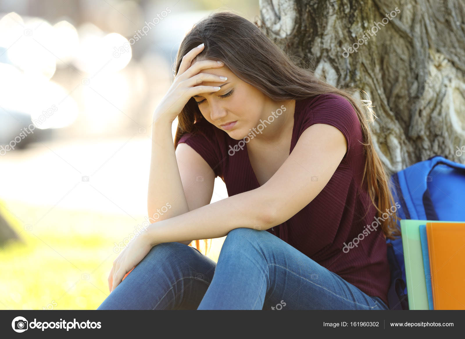 Concerned student lamenting outdoors Stock Photo by ©AntonioGuillemF ...