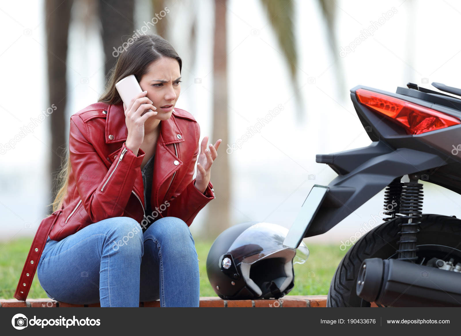 Angry biker calling insurance beside a motorbike — Stock Photo ...