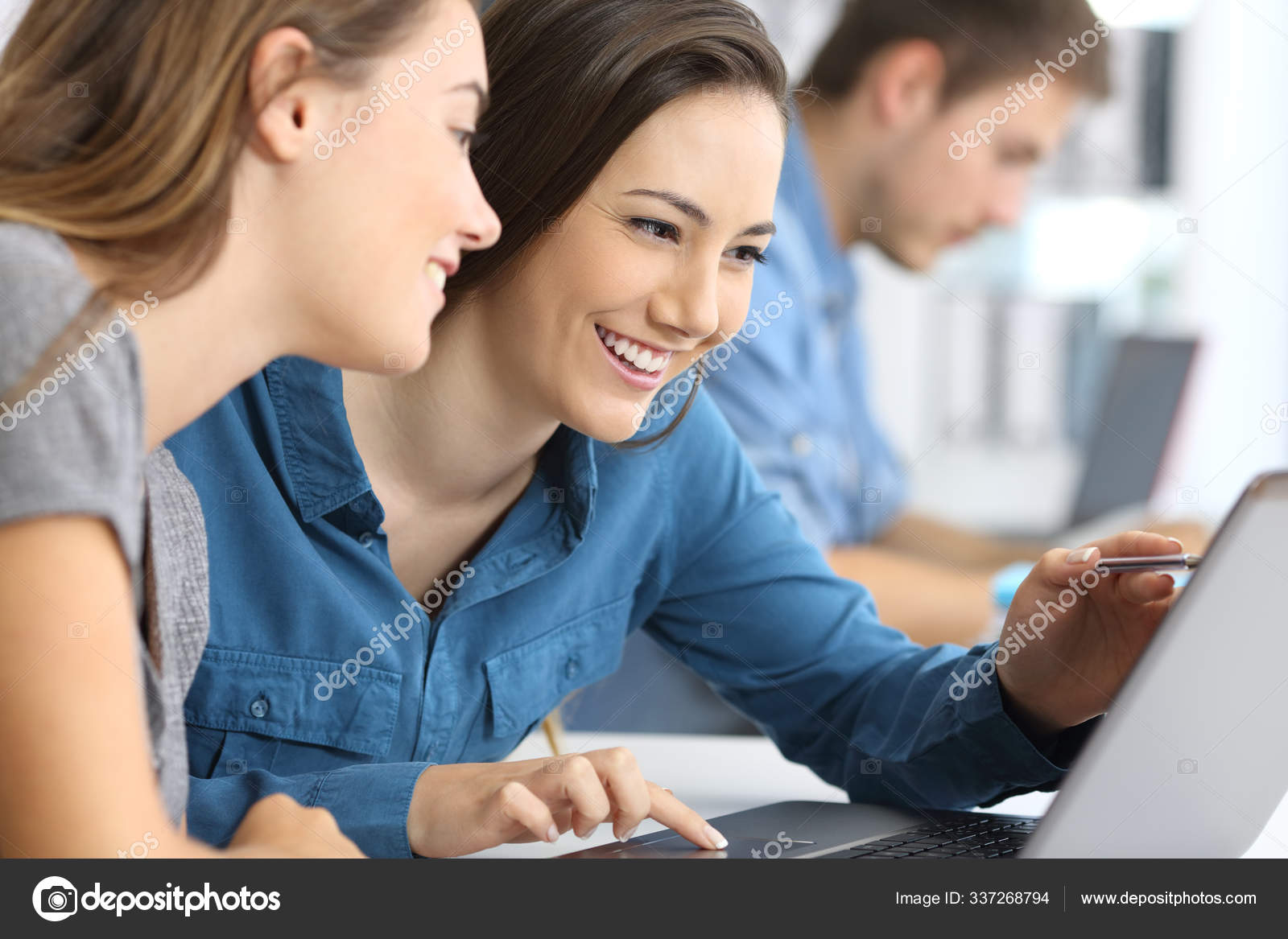 Two employees working on line together — Stock Photo © AntonioGuillemF ...