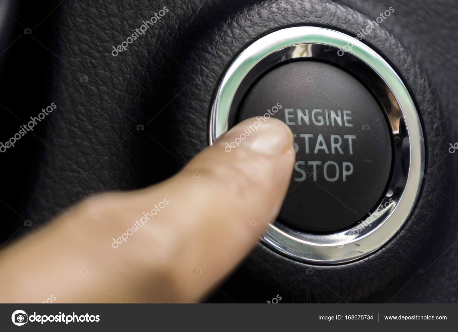 Car driver starting the engine keyless. Stock Photo by ©mrfiza 168675734