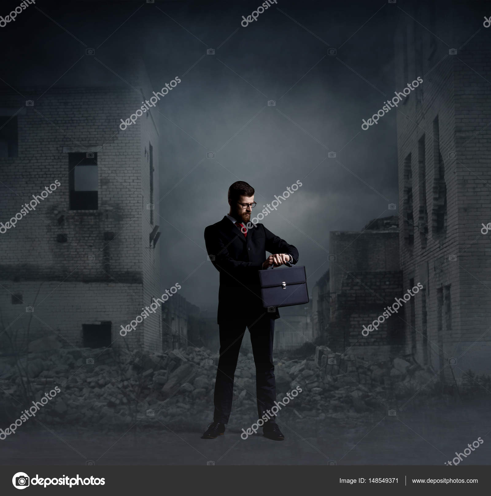 Businessman in black suit Stock Photo by ©shmeljov 148549371