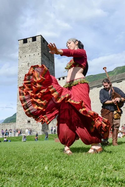 Medieval music group featuring a belly dancer at Castelgrande ca ...