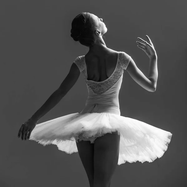 Ballerina dancing wearing tutu in studio — Stock Photo © ayakovlev_com ...