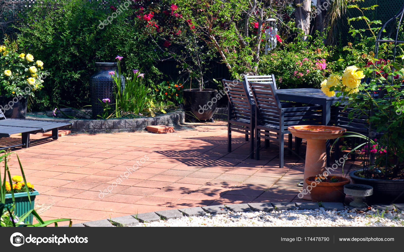 Courtyard garden setting — Stock Photo © amarosy #174478790