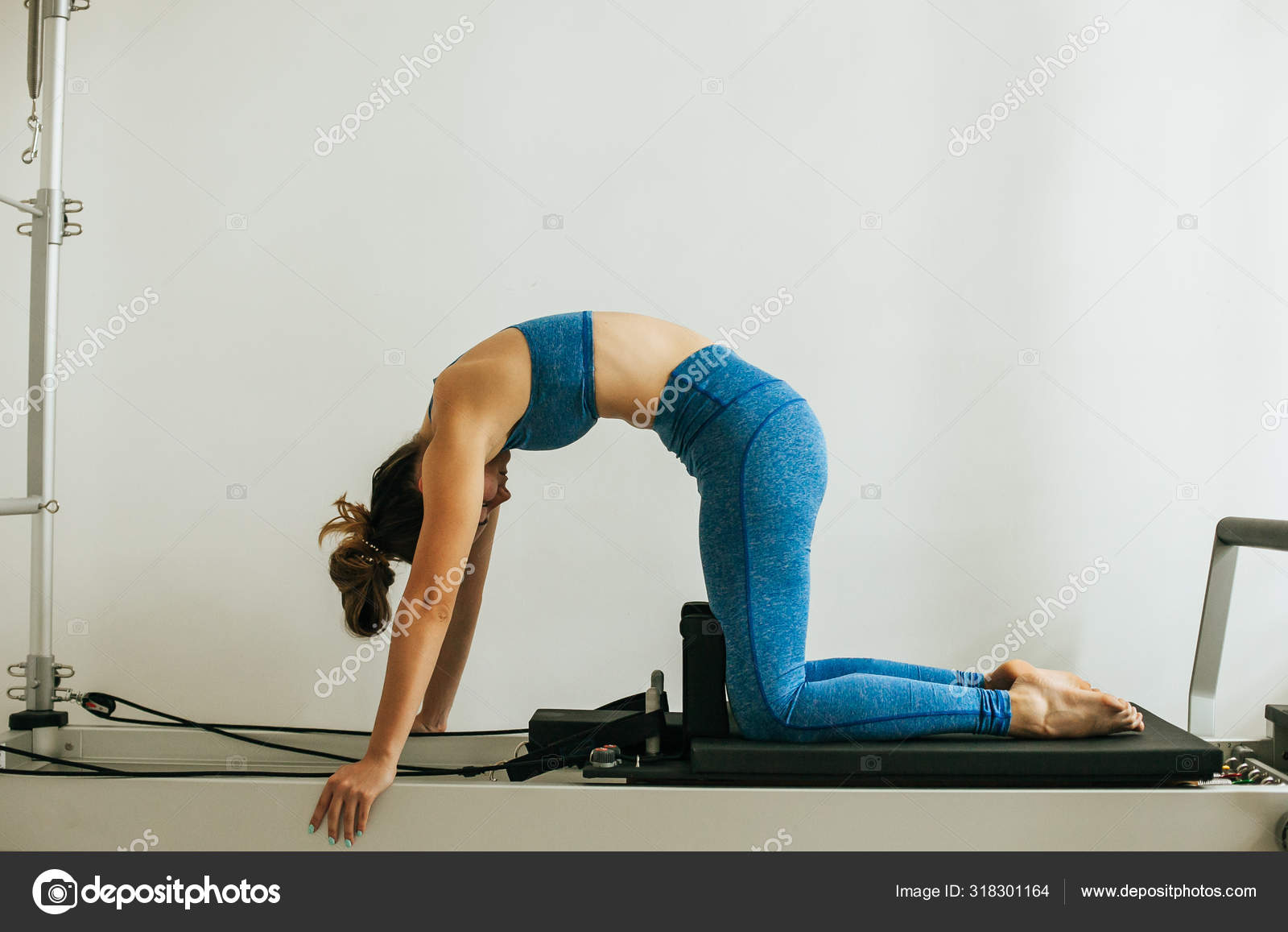Woman Performing Pilates Exercise Using Cadillac Trapeze Table — Stock ...