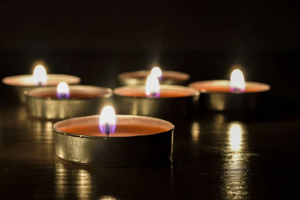 candles with fire, small hot candles, fire - Stock Image - Everypixel