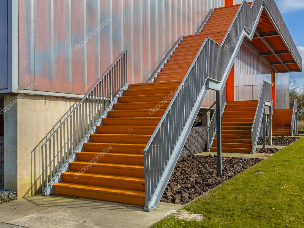 Orange emergency exit stairs — Stock Photo © CreativeNature #169136038