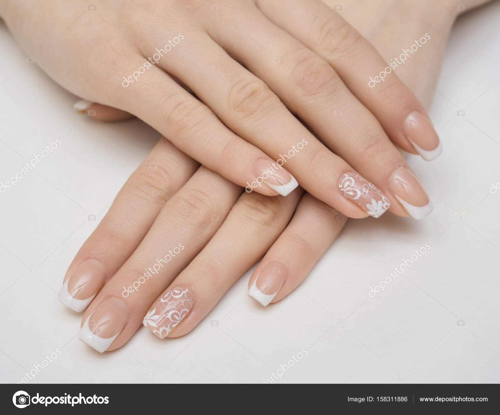 Light manicure in light on a white background. — Stock Photo © volniy ...