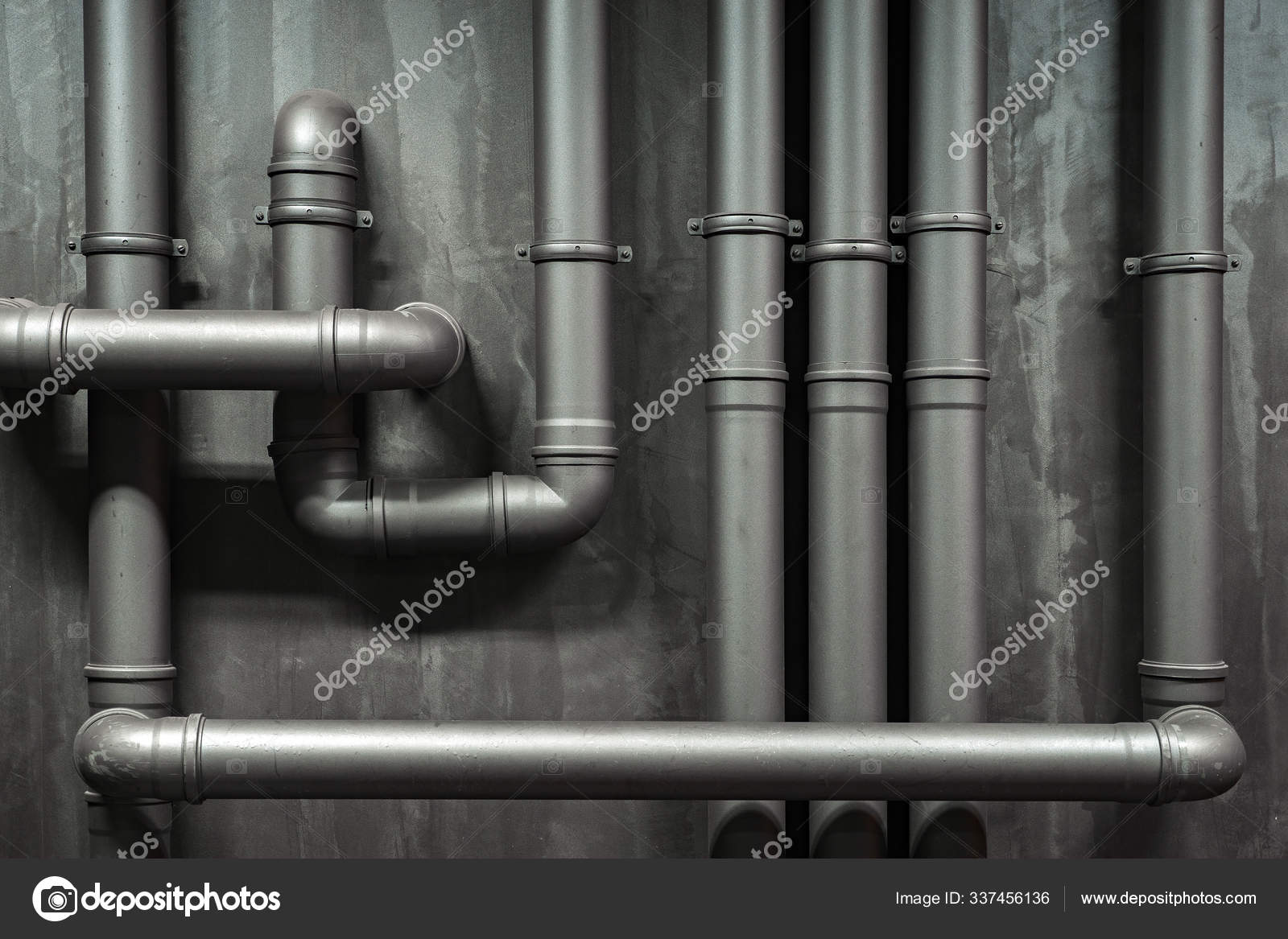 Close up of a wall with pipes. Metallic tubes wall texture. Black ...