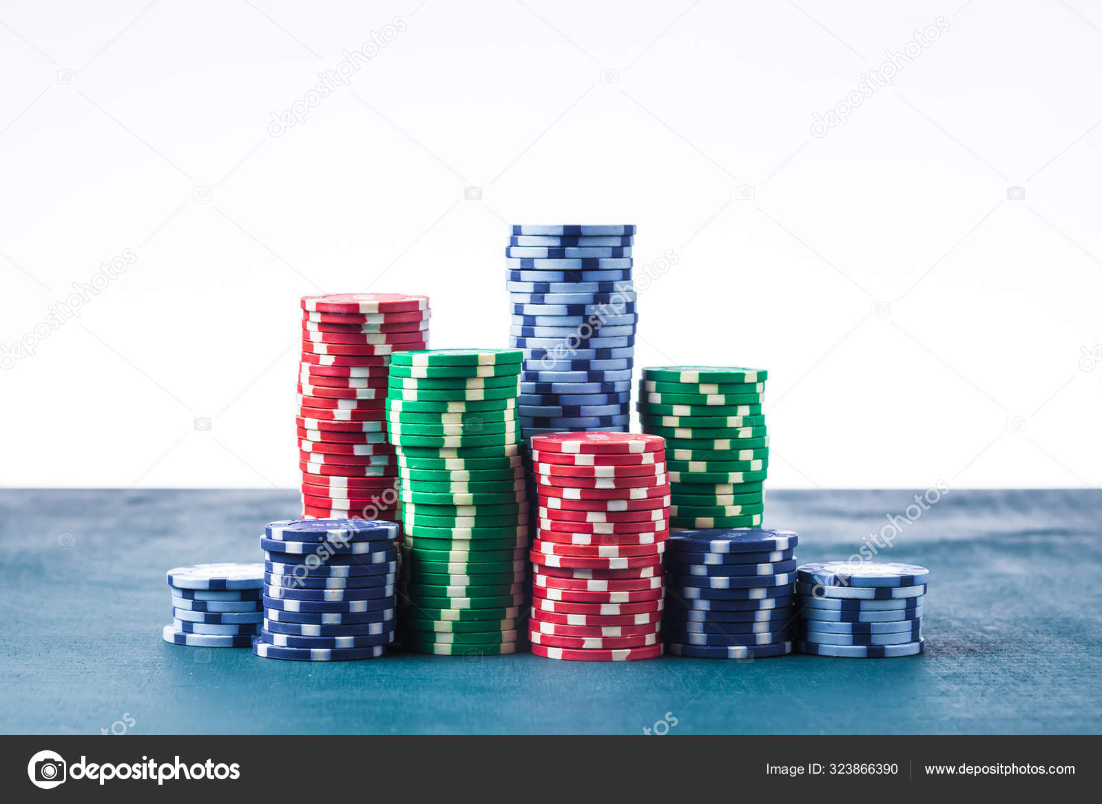 Stack of poker chips on the table on a white background isolate — Stock ...