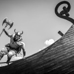 Strong Viking jumping from his ship to attack Stock Photo by ©khosrork ...