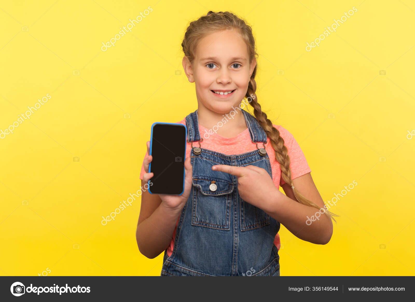 Portrait Nice Little Girl Braid Denim Overalls Pointing Screen Mock ...