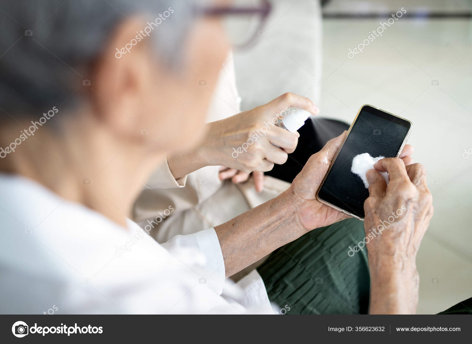 Hand Senior Woman Spraying Alcohol Disinfectant Spray Mobile Phone ...