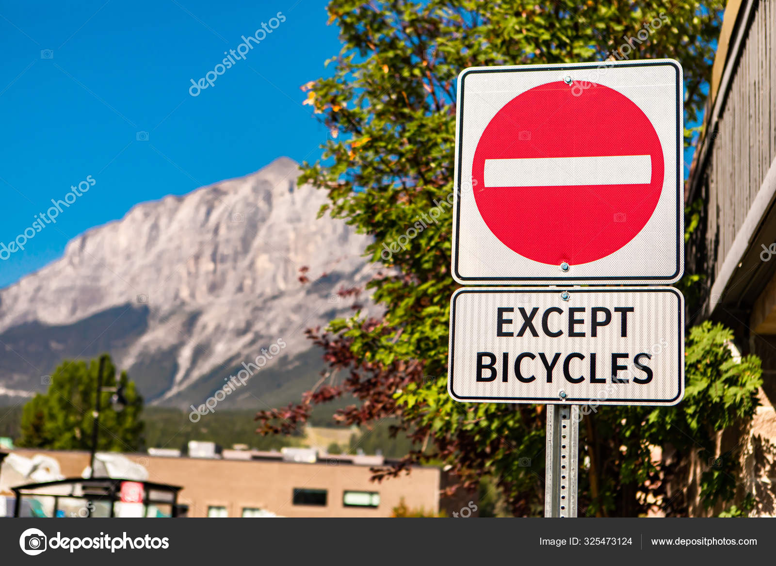 Do not enter, except bicycles road sign — Stock Photo © Valmedia #325473124
