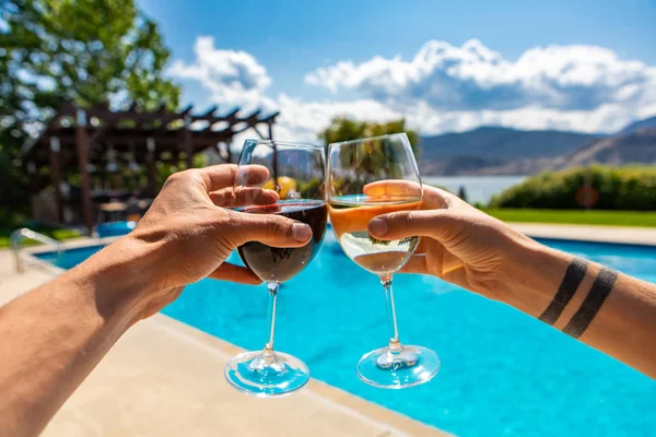 wine drinking tasting on swimming pool - Stock Image - Everypixel