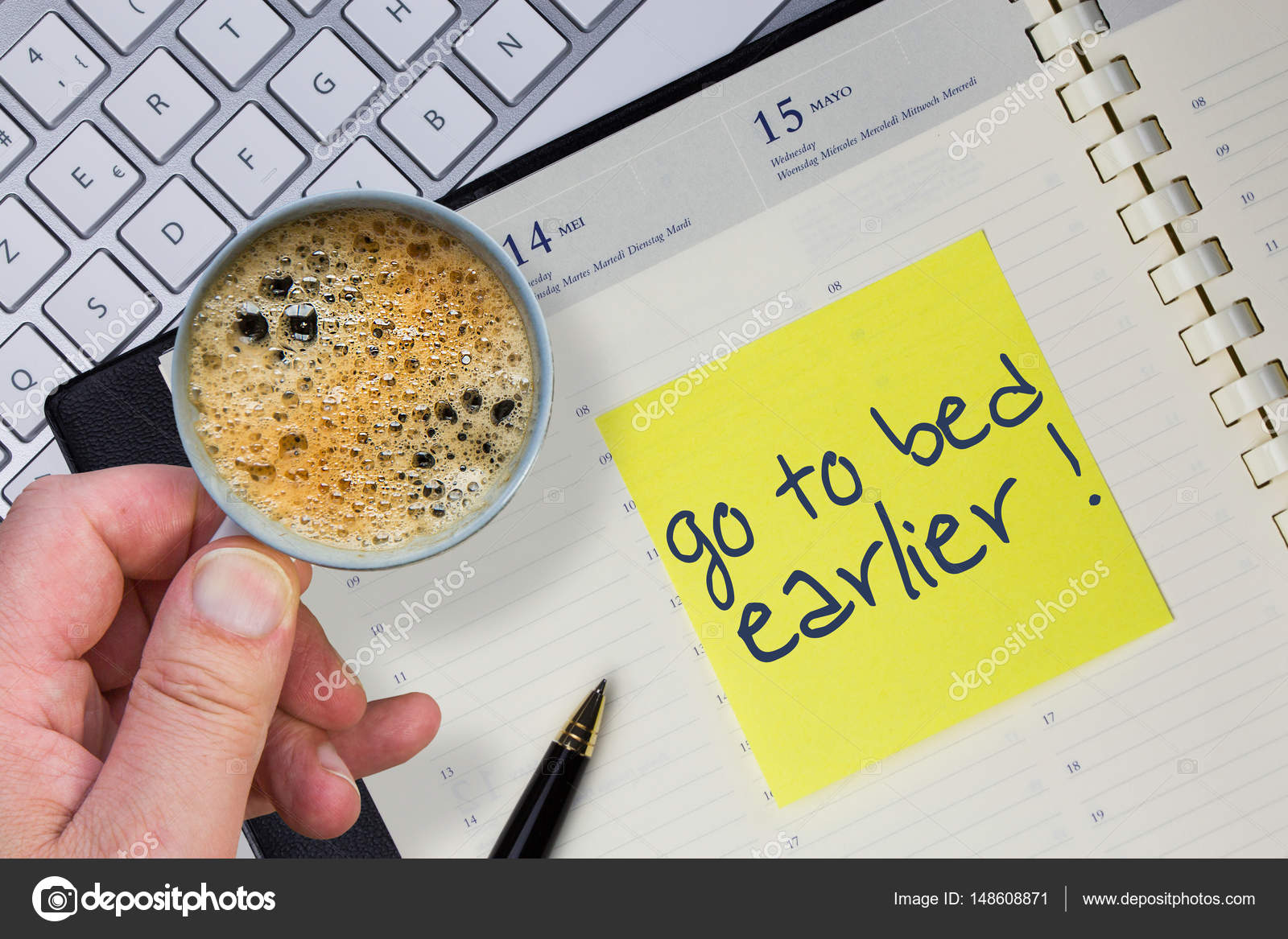 Paper note with the words - Go to bet earlier - in business desk. How ...