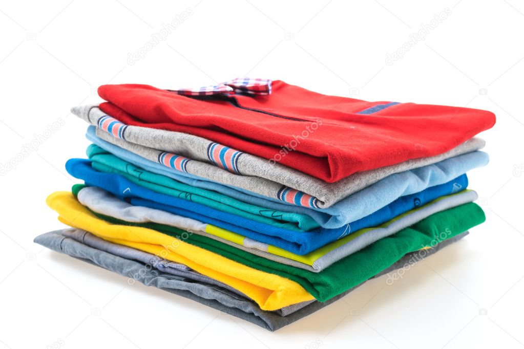 Stack of T shirts and polo shirts Stock Photo by ©mrsiraphol 127026518