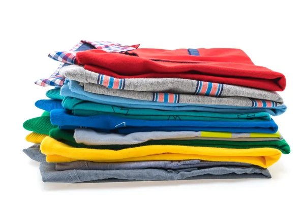 Stack of T shirts and polo shirts Stock Photo by ©mrsiraphol 127026518